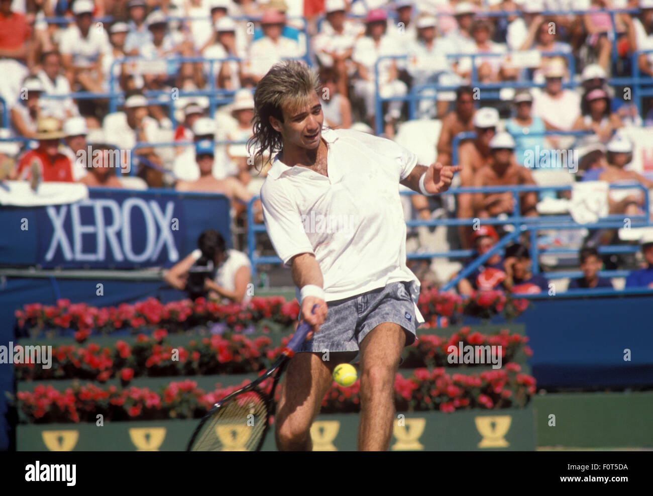 Andre Agassi in action against Boris Becker at the Newsweek Champions ...