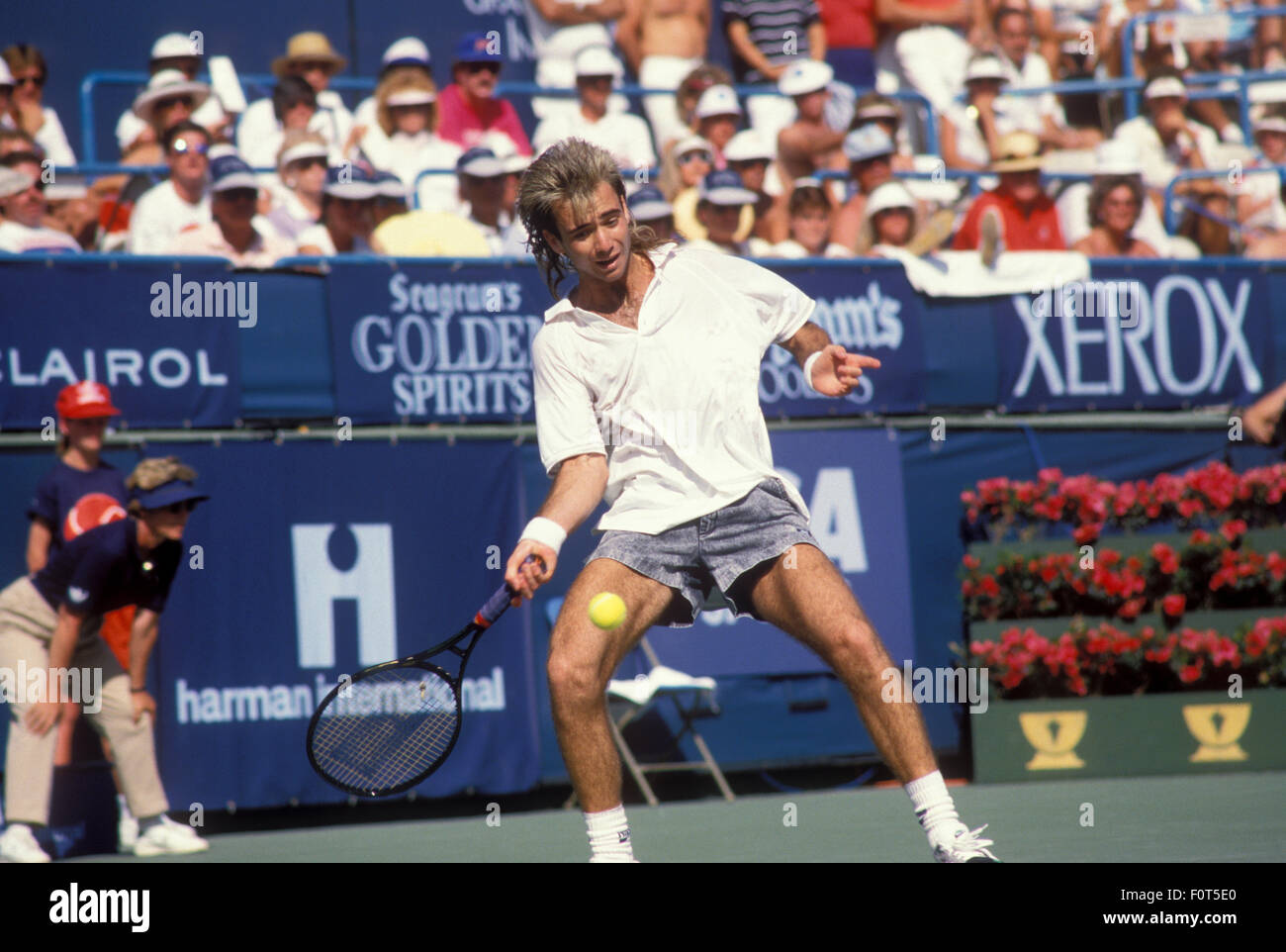 Andre Agassi in action against Boris Becker at the Newsweek Champions ...