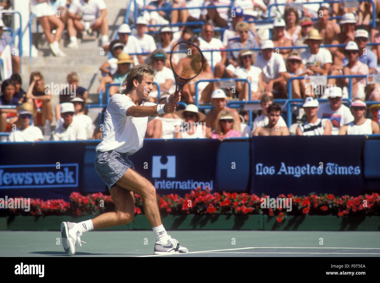 Andre Agassi in action against Boris Becker at the Newsweek Champions ...
