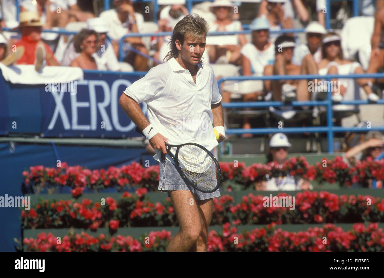 Andre Agassi in action against Boris Becker at the Newsweek Champions ...