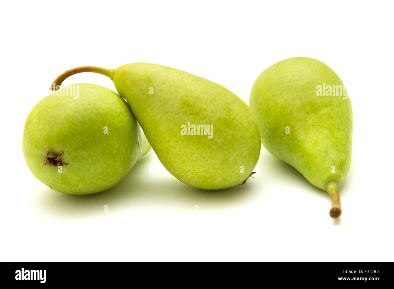 green pear isolated on white background Stock Photo - Alamy