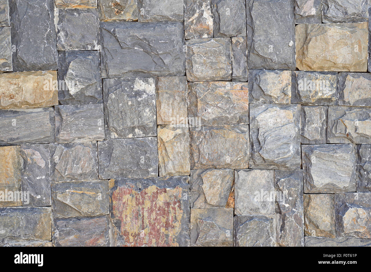 Stone wall as background or texture Stock Photo - Alamy