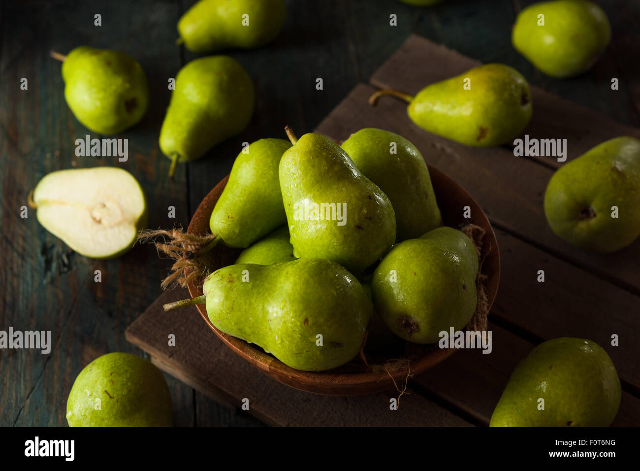 Green Organic Bartlett Pears in a Bowl Stock Photo - Alamy