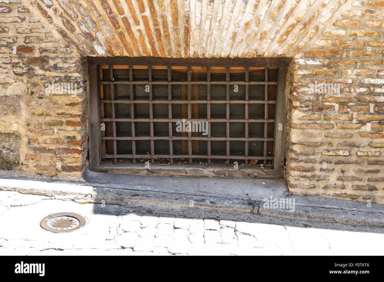 Old iron window a prison in Toledo Spain Stock Photo - Alamy