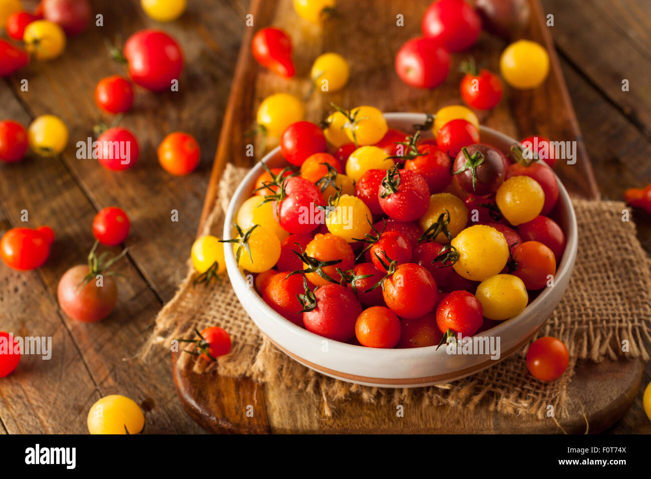 Organic Heirloom Cherry Tomatos in a Bowl Stock Photo - Alamy