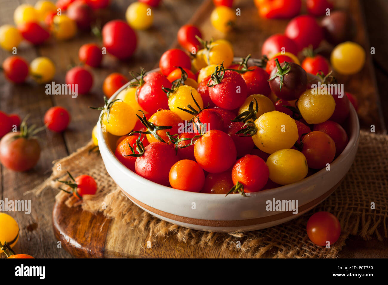 Organic Heirloom Cherry Tomatos in a Bowl Stock Photo - Alamy