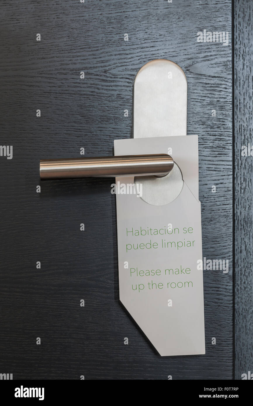 Hotel Door sign "Please make up the room" in spanish and english Stock ...