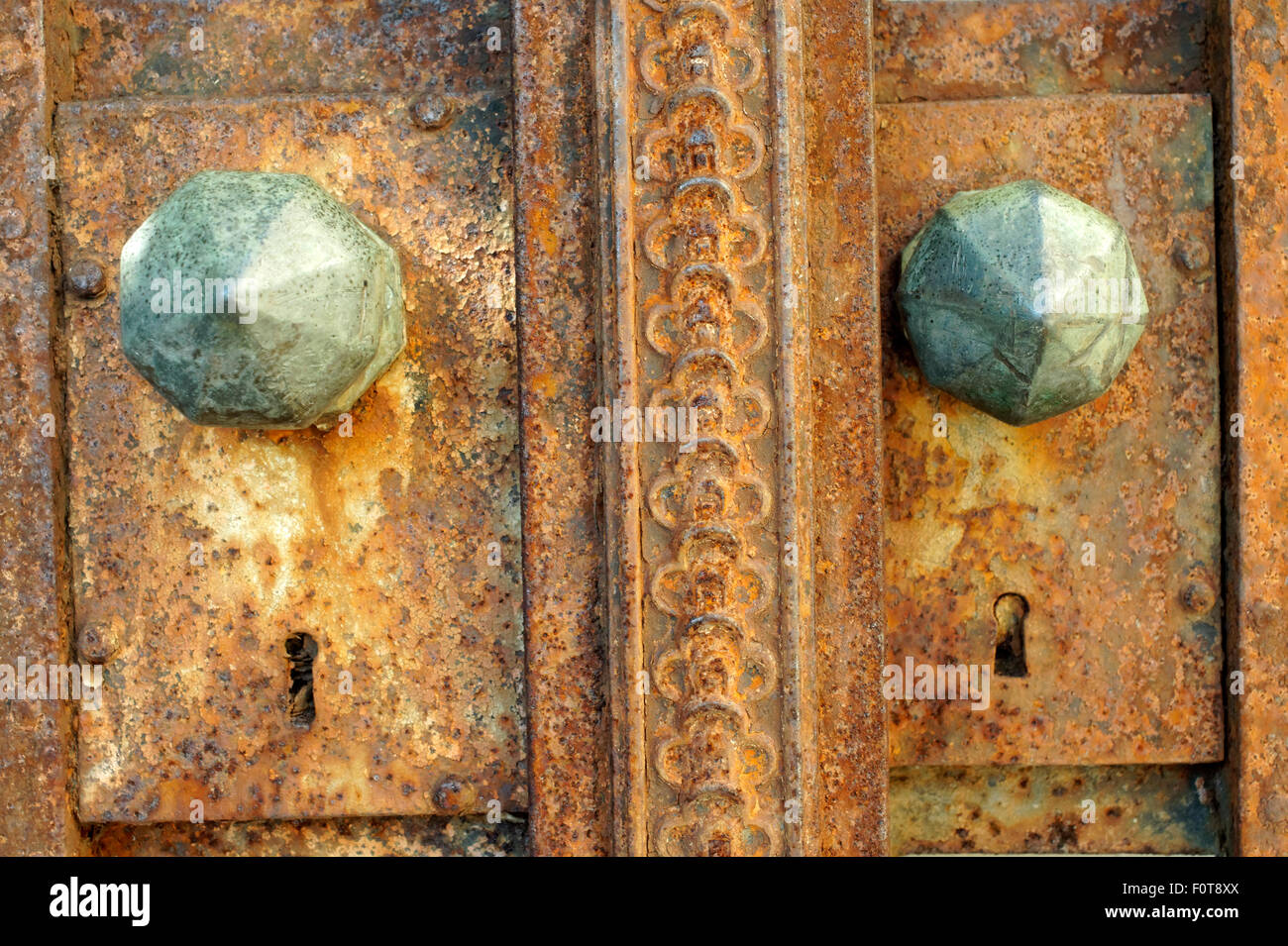 Detail of locks on an antique rusty iron gate from Egypt Stock Photo ...