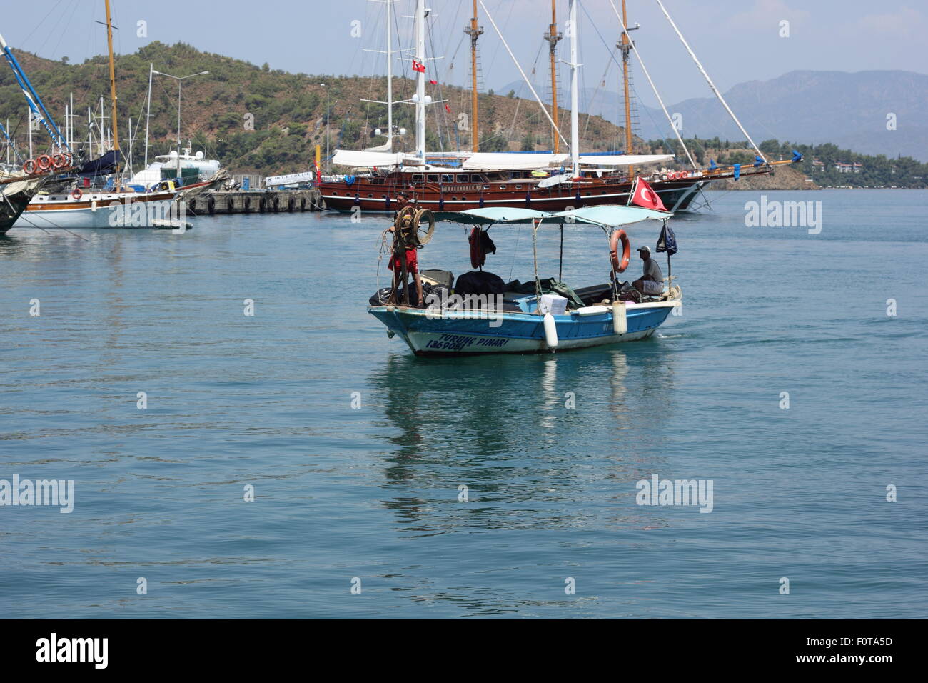 28TH JULY 2015, FETHIYE, TURKEY:A Fishing boat returning to port after ...