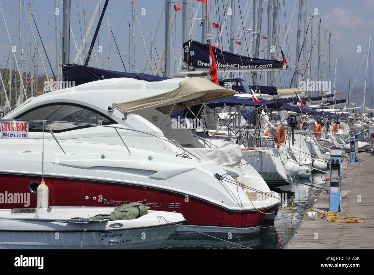 Yachts and boats moored in the port of Fethiye in Turkey Stock Photo ...
