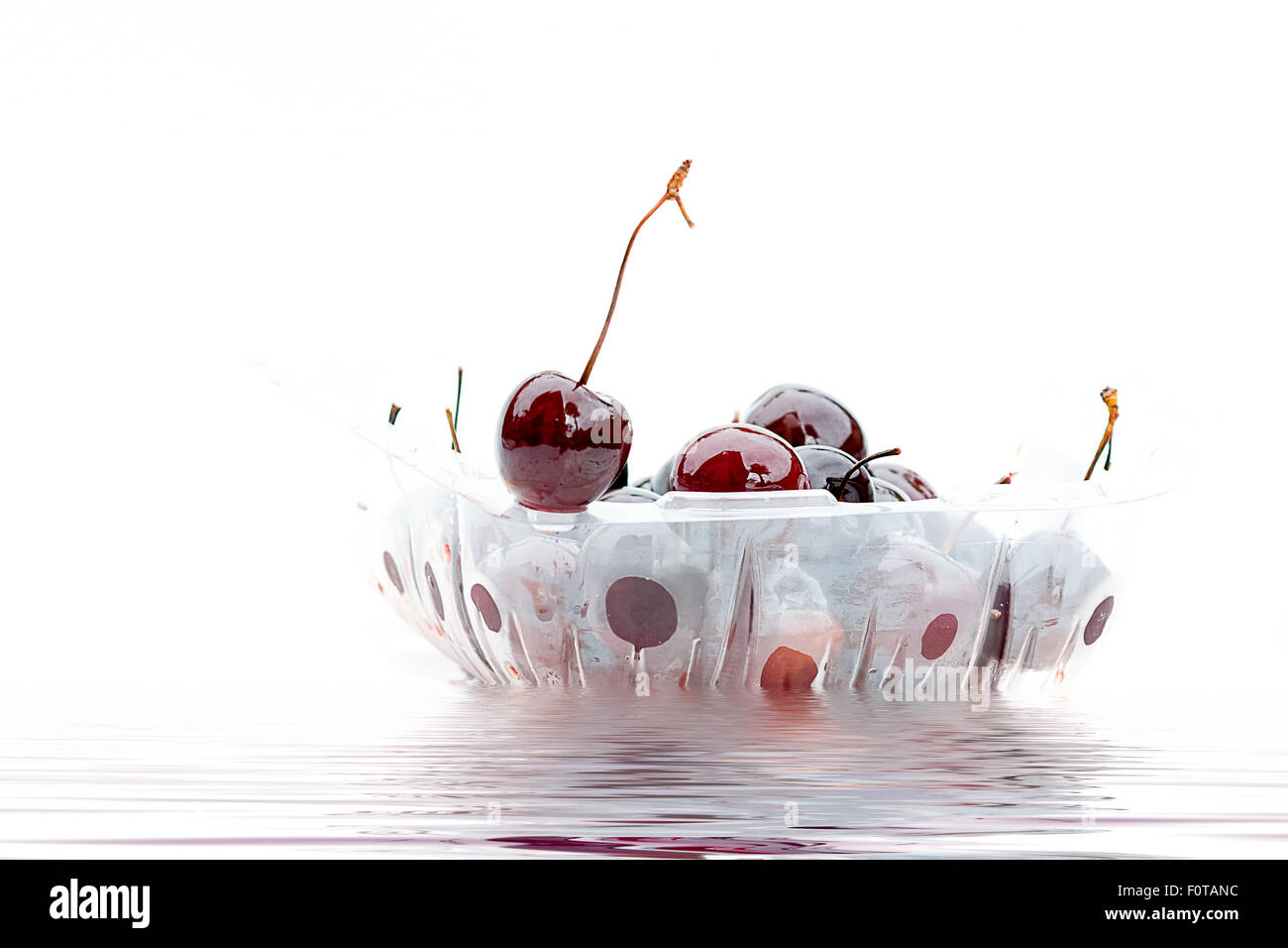 sweet cherry inside plastic box Stock Photo - Alamy