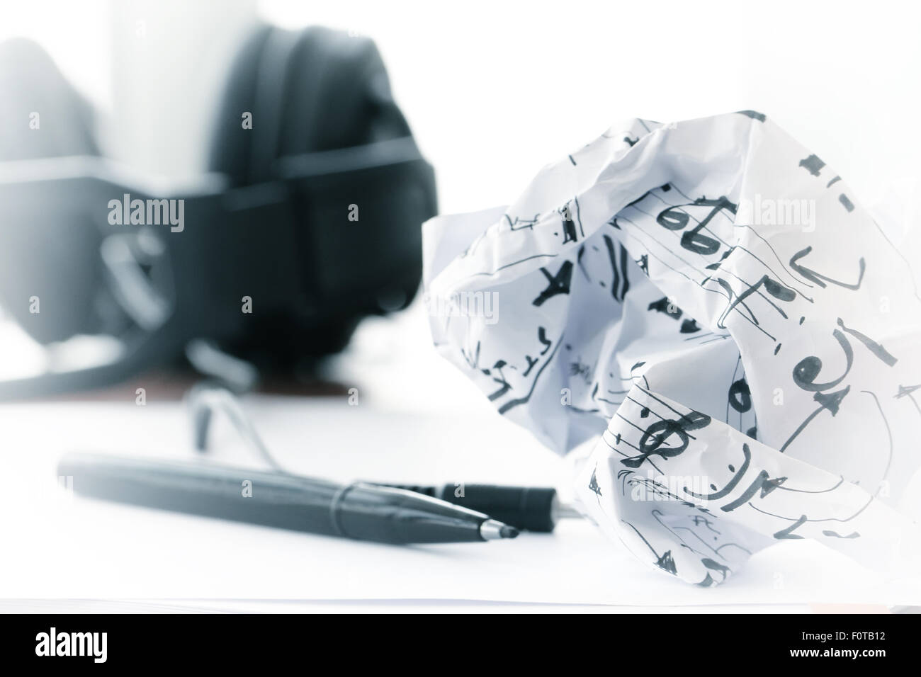 composing music concept with shallow DOF evenly matched crumpled ...