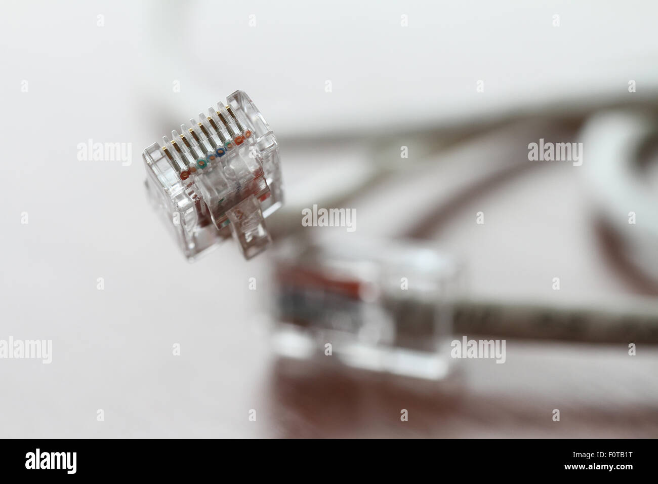 close up of RJ45 Plug Network on wood desk Stock Photo - Alamy