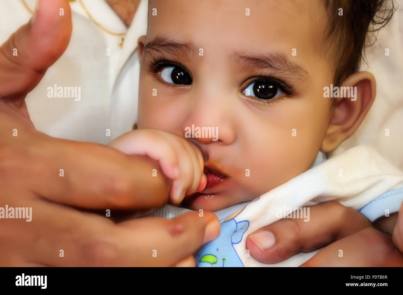 Child sucking hi-res stock photography and images - Alamy