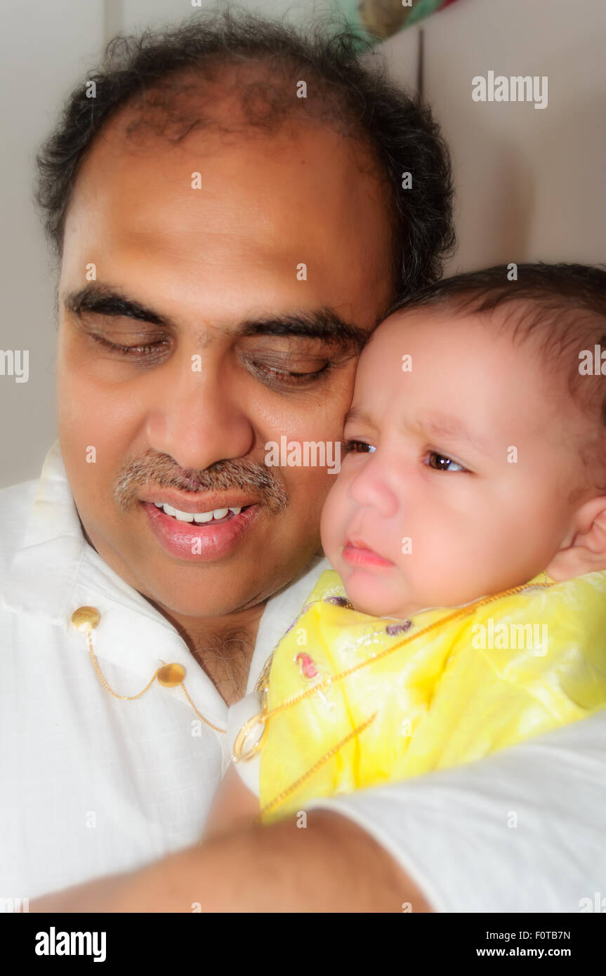 Portrait of a happy family, Bengali father with sweet little son ...