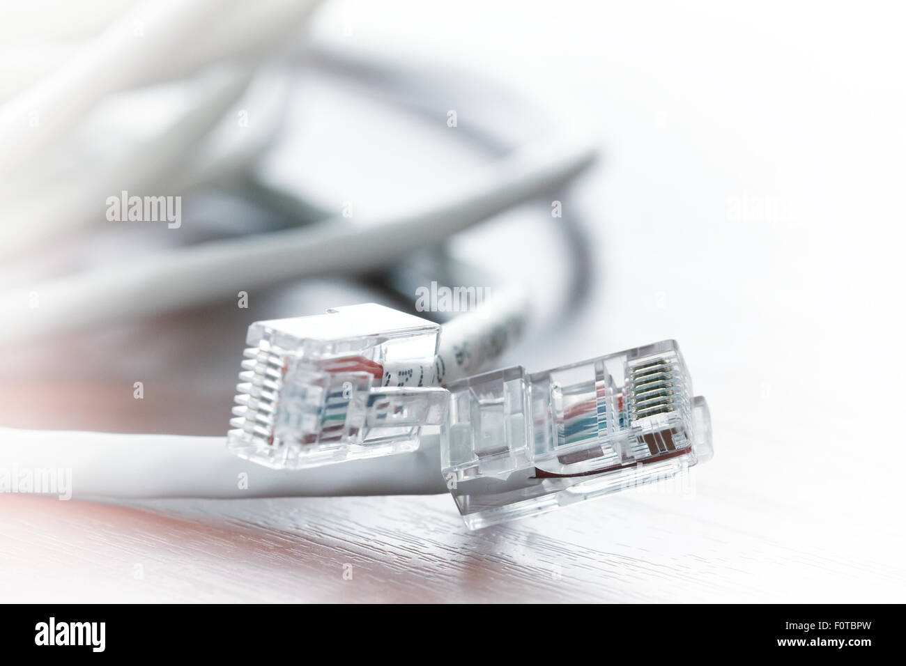 close up of RJ45 Plug Network on wood desk Stock Photo - Alamy