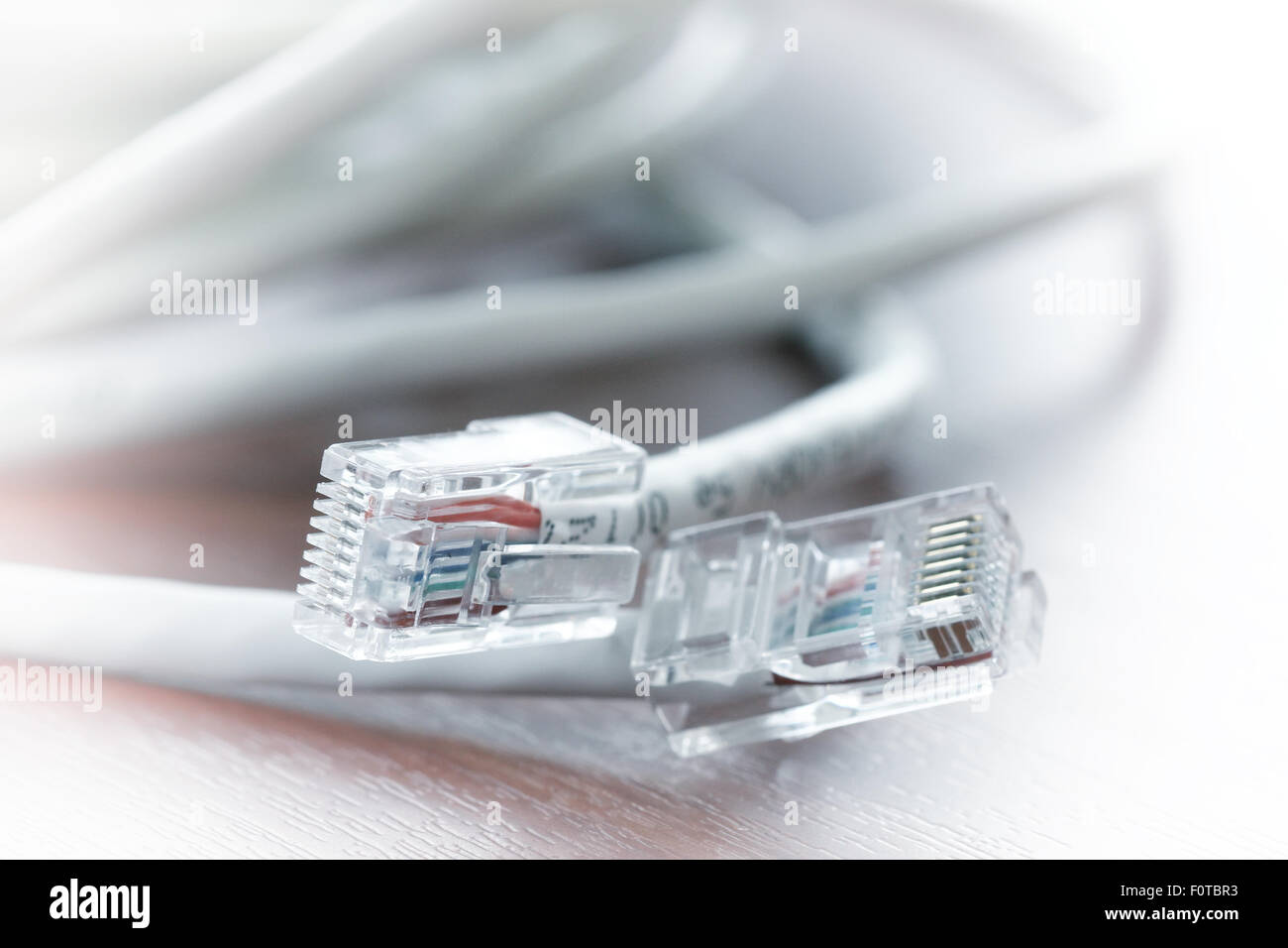 close up of RJ45 Plug Network on wood desk Stock Photo - Alamy