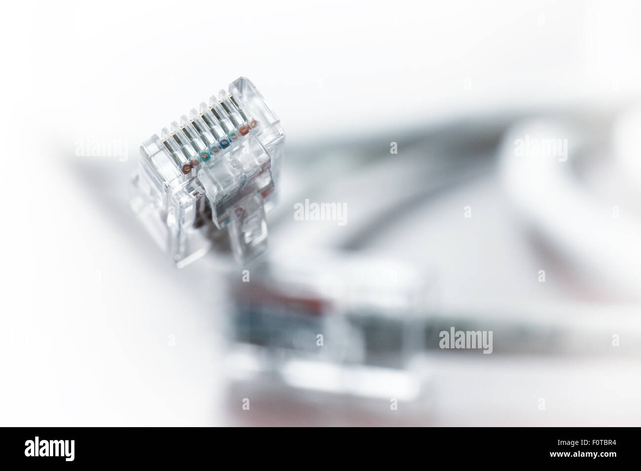 close up of RJ45 Plug Network on wood desk Stock Photo - Alamy