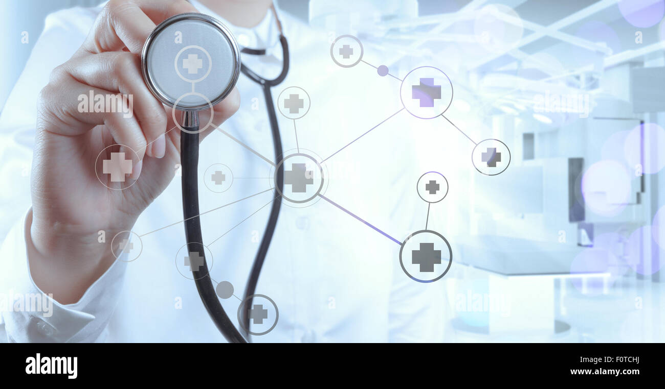 Medicine doctor hand working with modern computer interface as medical ...