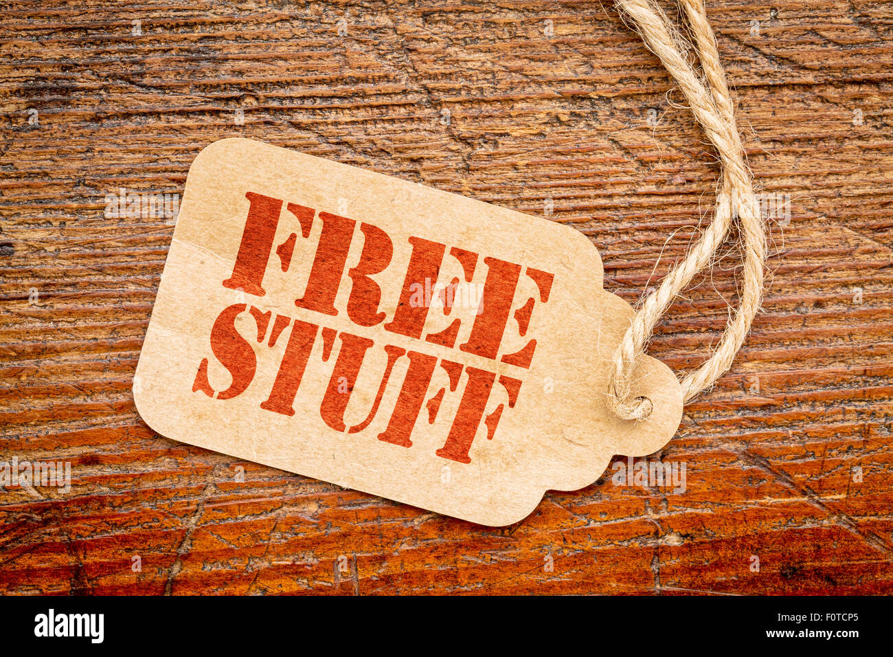 free stuff sign - a paper price tag against rustic red painted barn ...