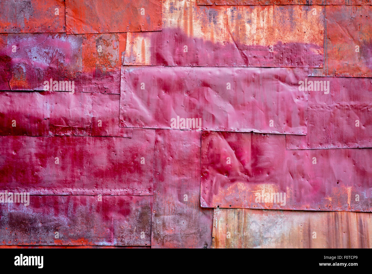 rusty red painted metal background texture - metal sheets covering a ...