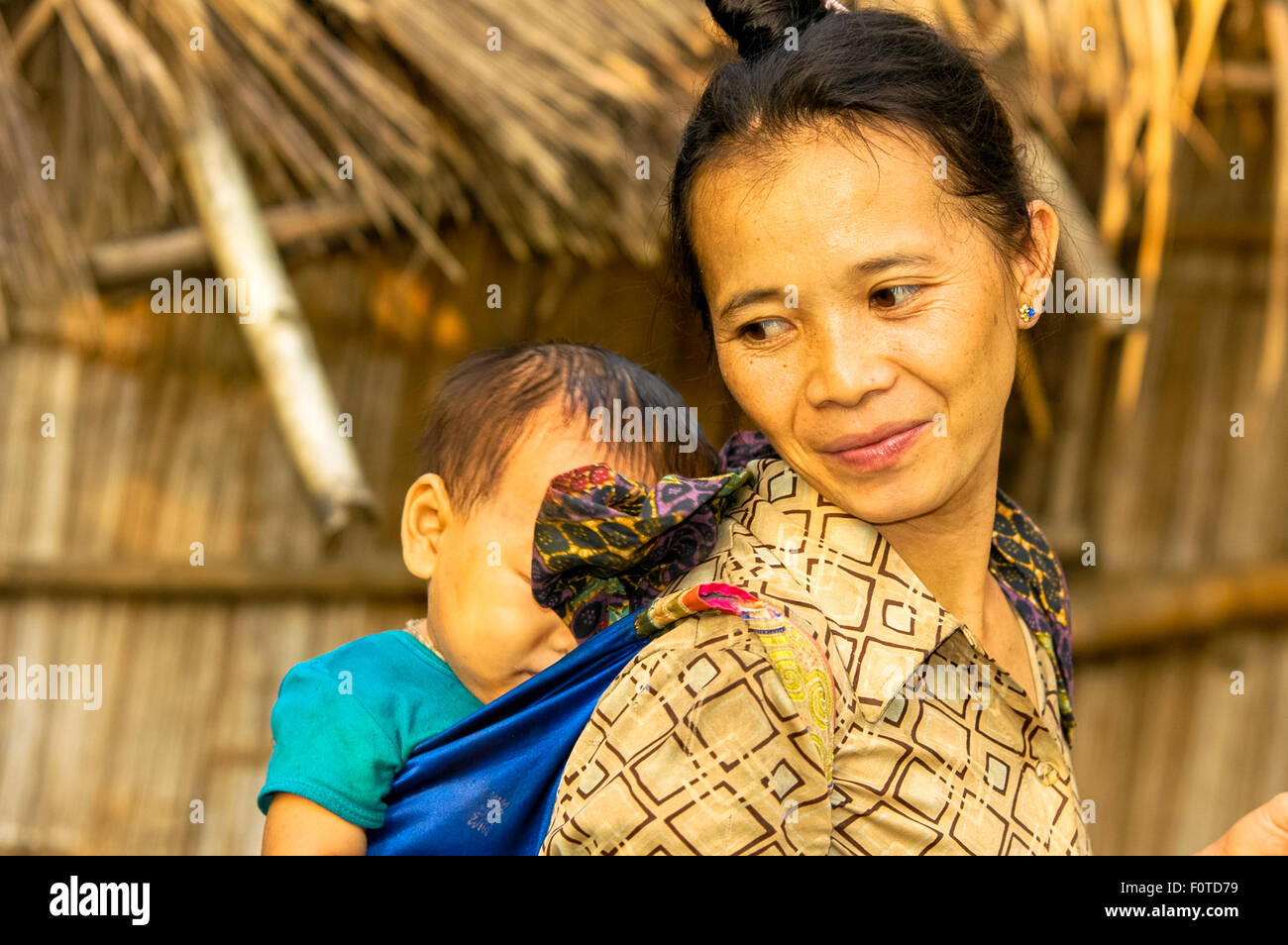 mother with child at hmong people at mekong river in laos Stock Photo ...