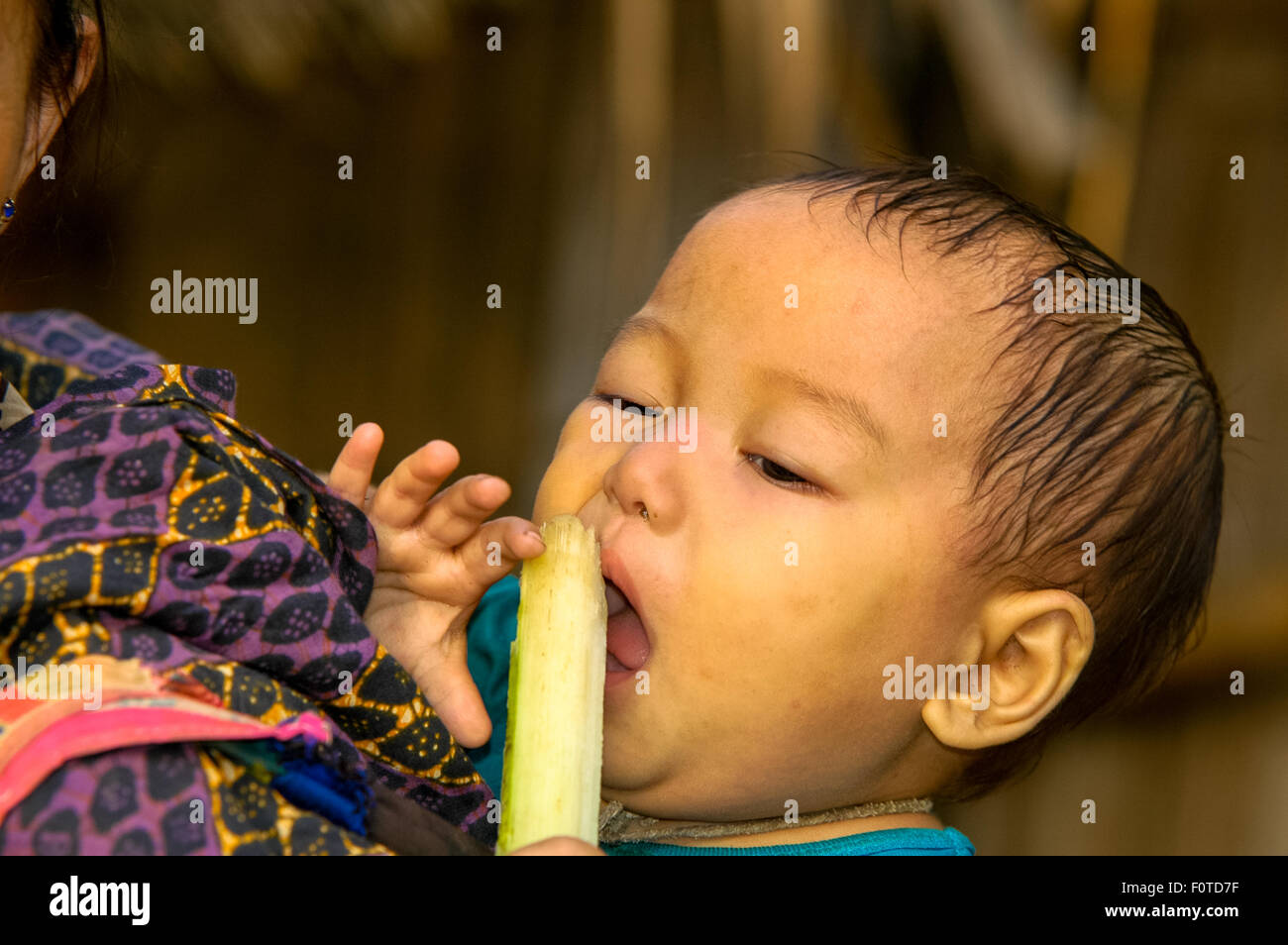mother with child at hmong people at mekong river in laos Stock Photo ...
