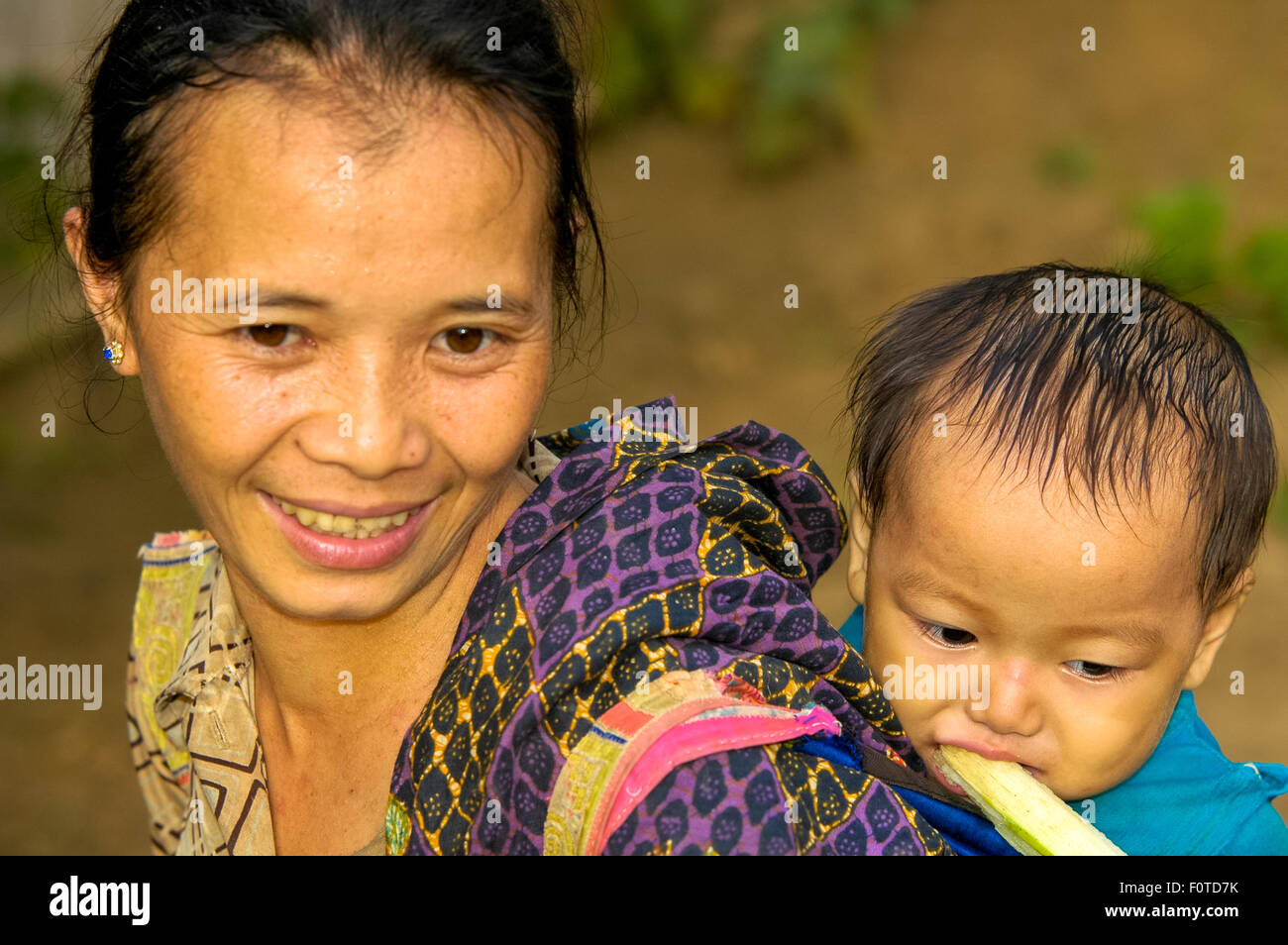 mother with child at hmong people at mekong river in laos Stock Photo ...