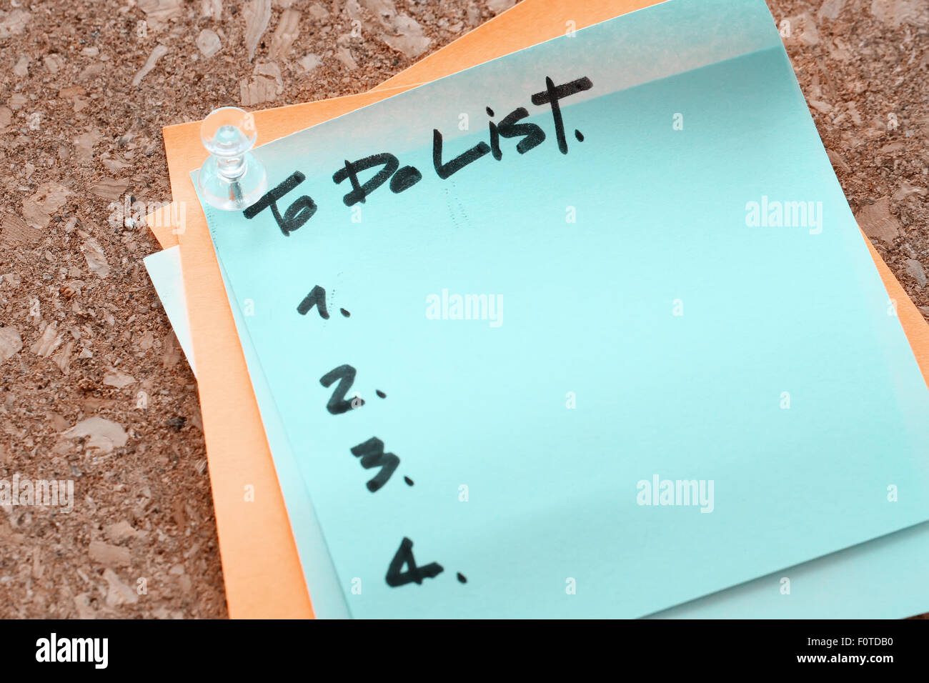 close up of pin and hand drawn business strategy graph chart on sticky ...