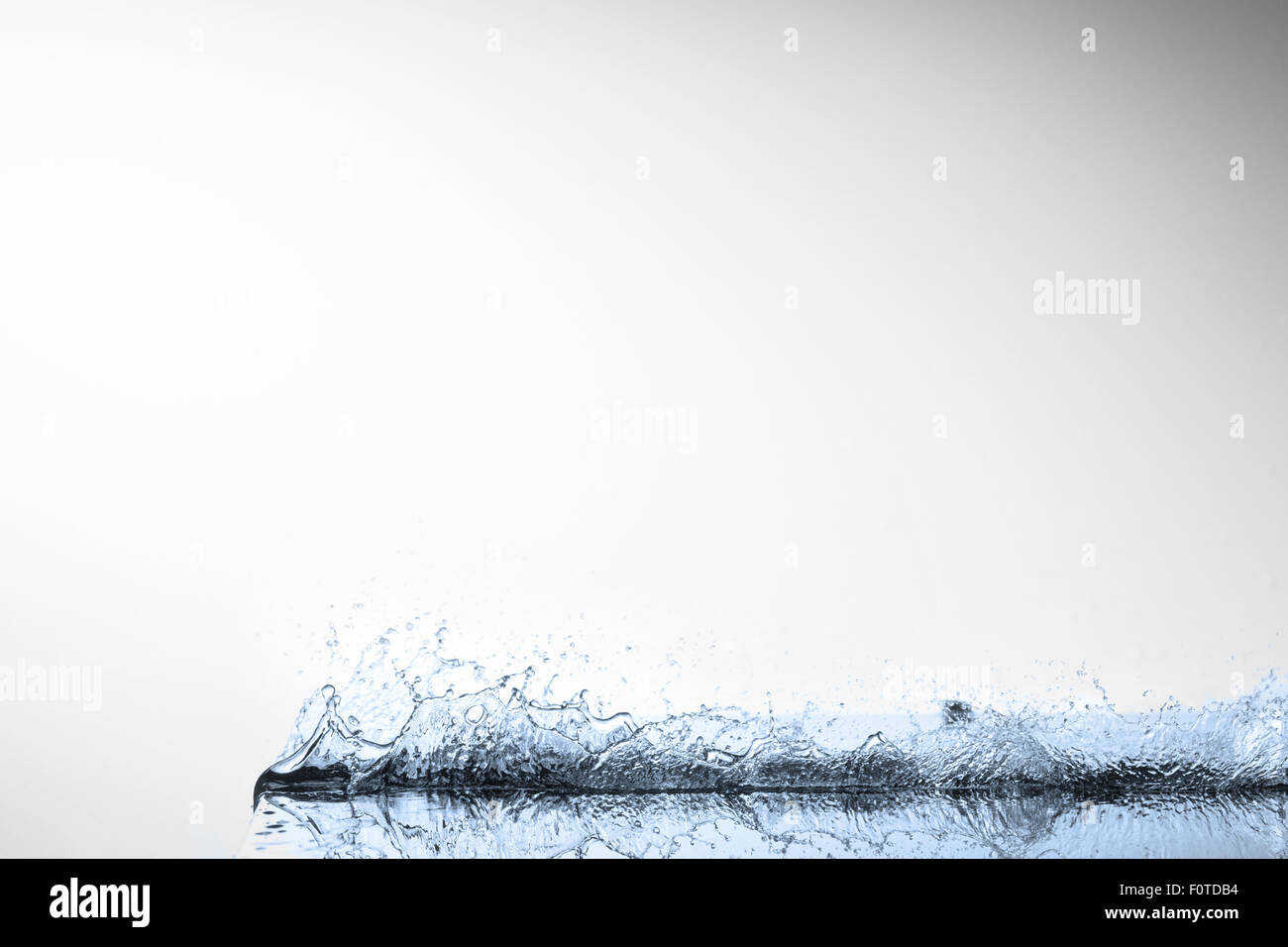 Water splash over white background Stock Photo - Alamy