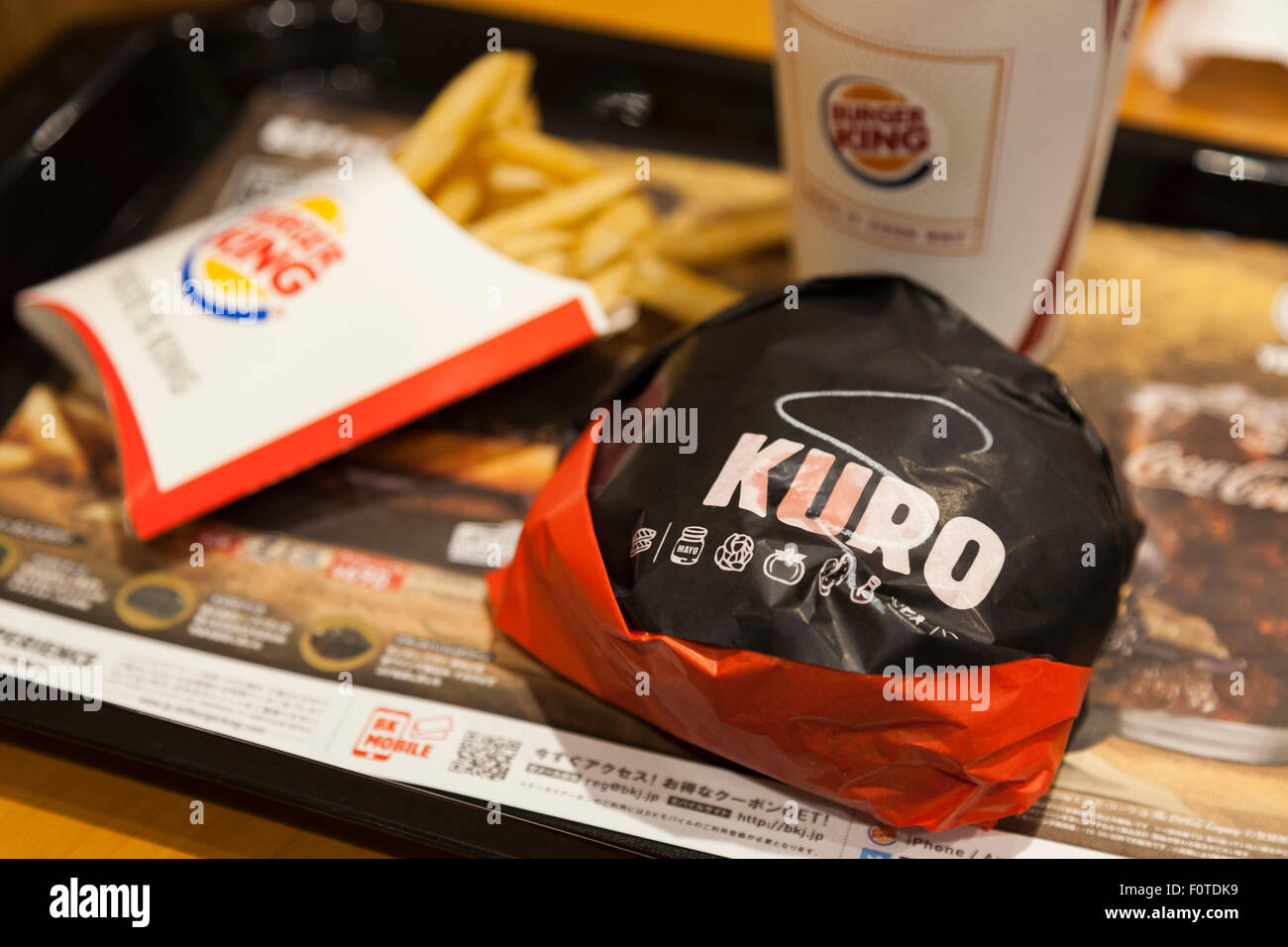 Tokyo, Japan. 21st Aug, 2015. Burger King's new black burger ''Kuro ...