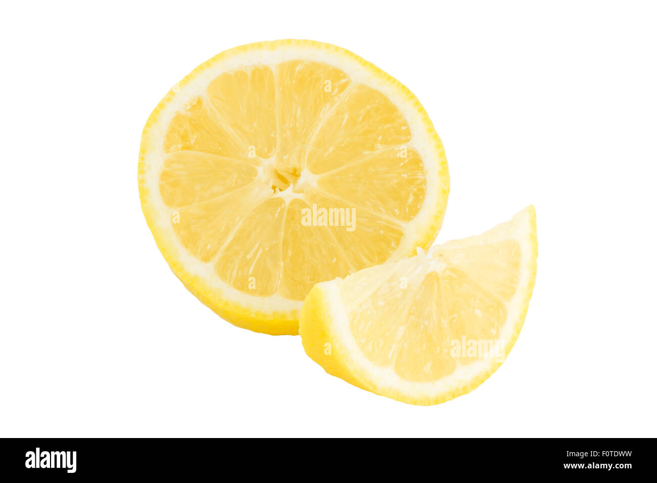 Close-up of half and quarter slices of lemon, isolated on white ...