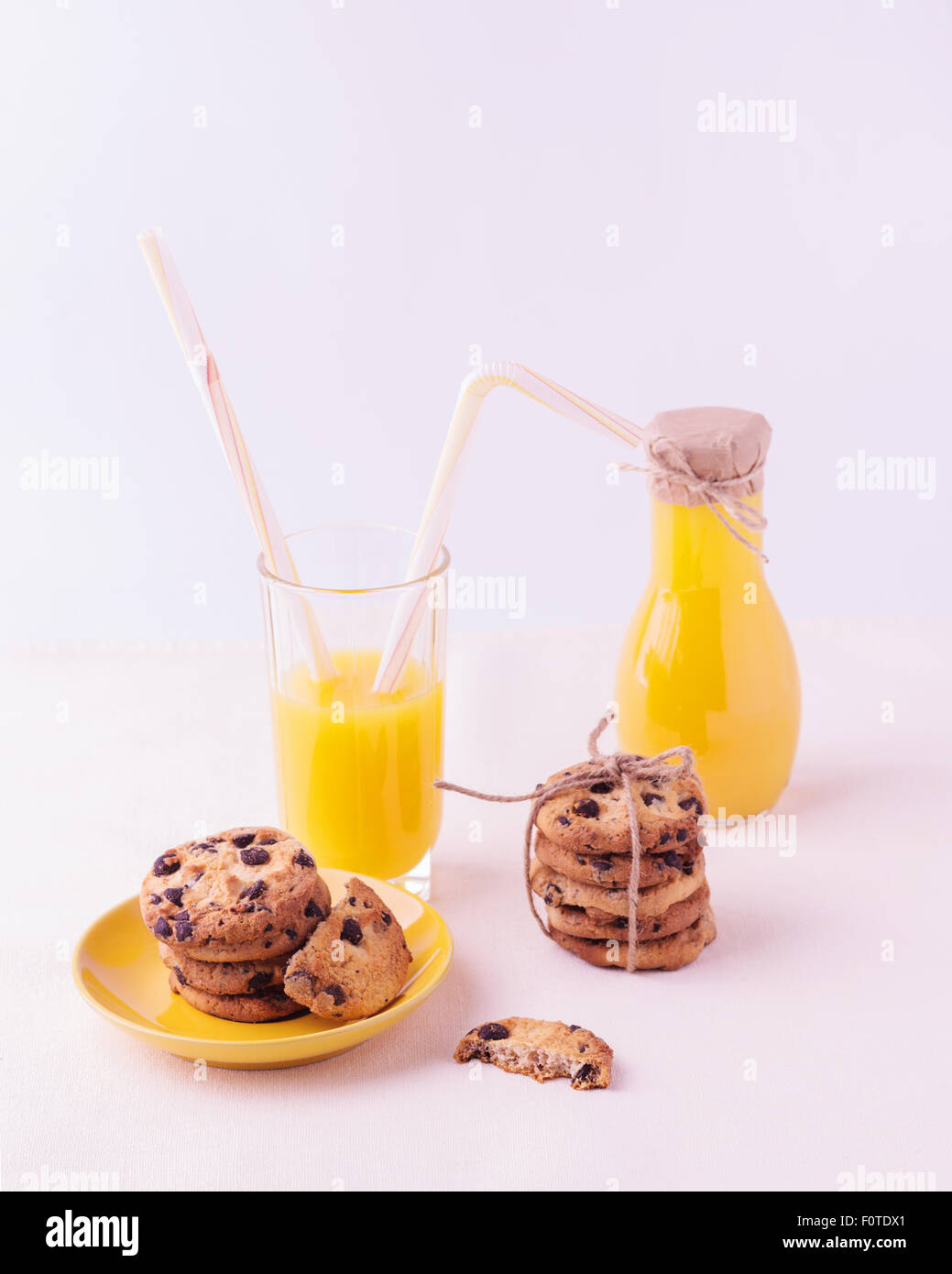 Homemade cookies with chocolate and orange juice. Isolated on a white ...