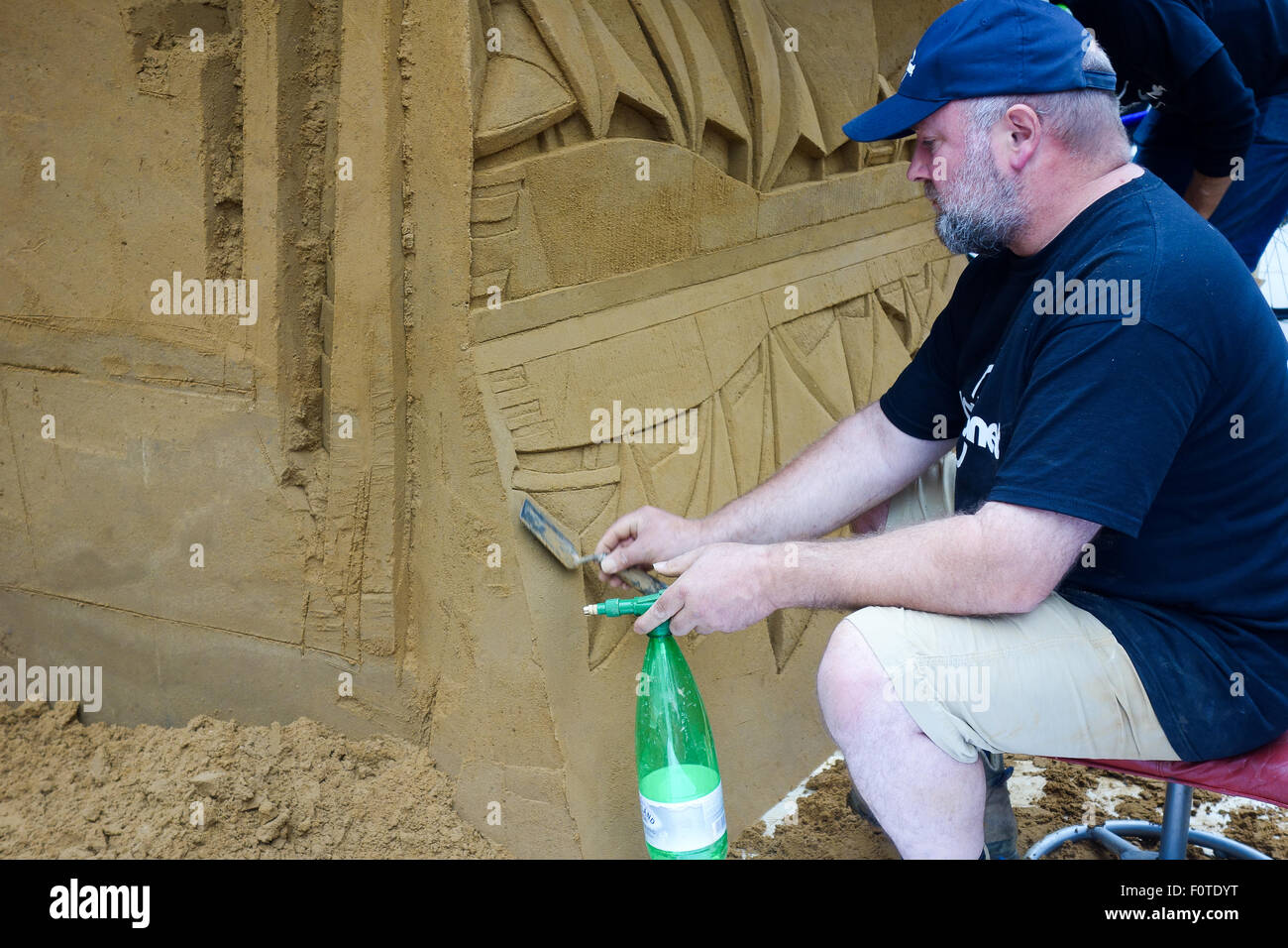 A sand sculpture calving famous landmarks on top five destinations of ...