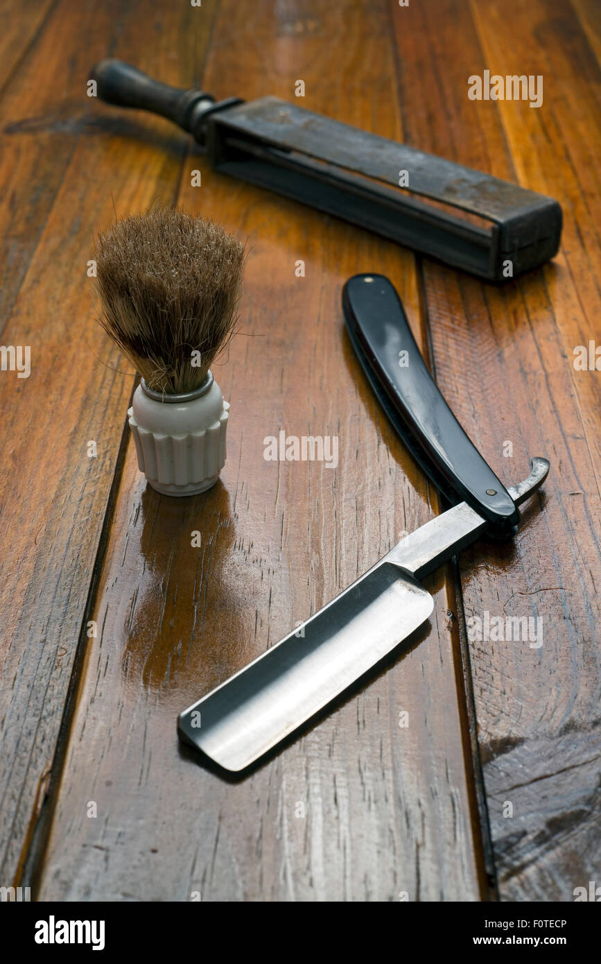 Old barber tools on wooden background Stock Photo - Alamy