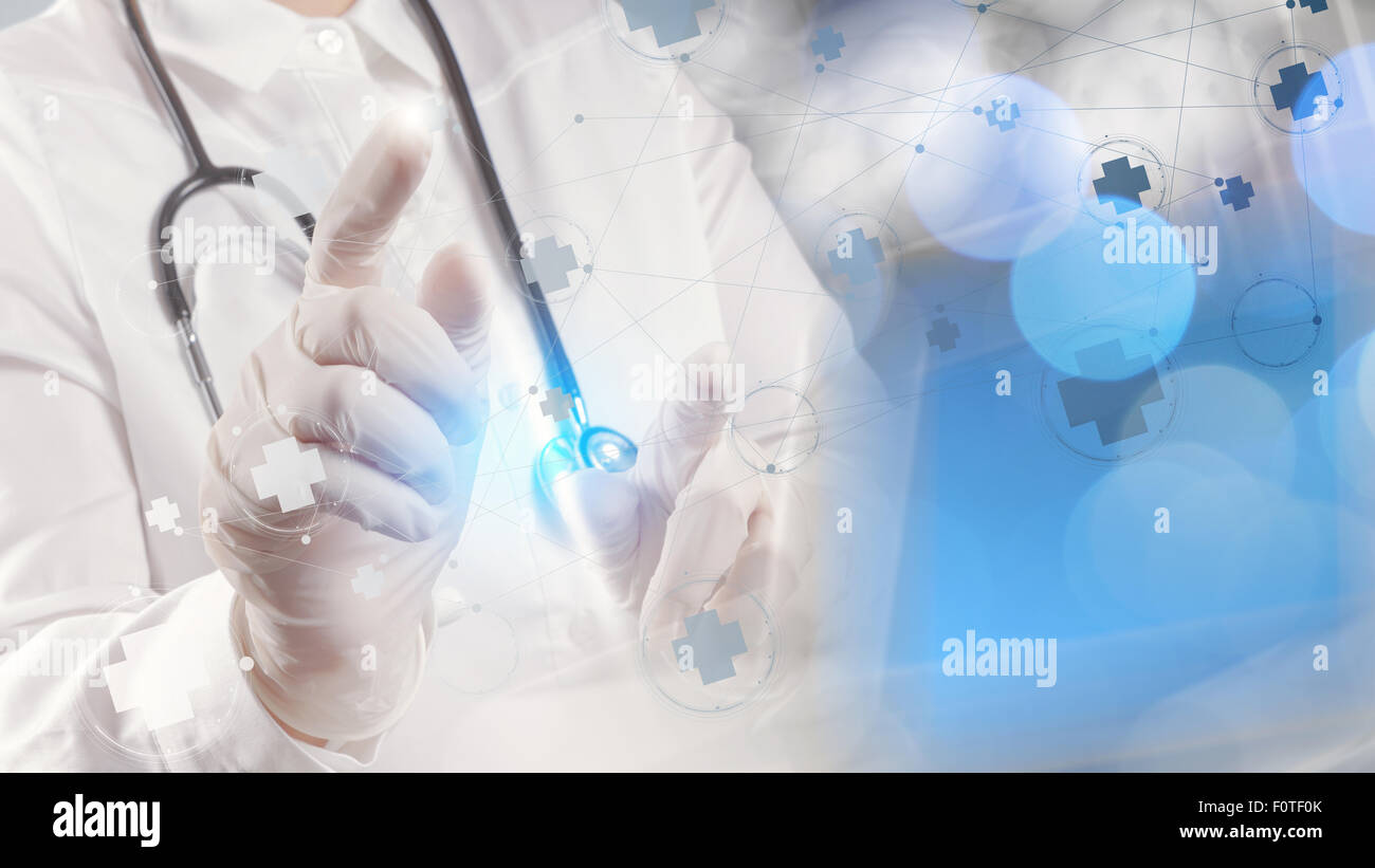 Medicine doctor hand working with modern computer interface as medical ...