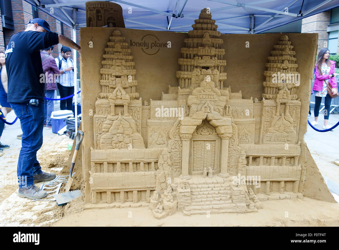 A sand sculpture calving famous landmarks on top five destinations of ...