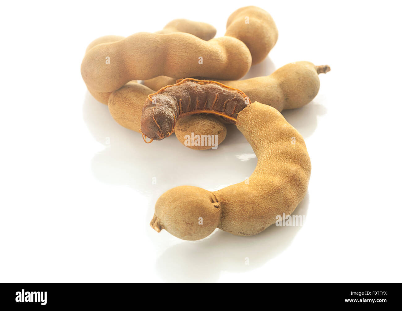 Tamarind isolated on a white background Stock Photo - Alamy