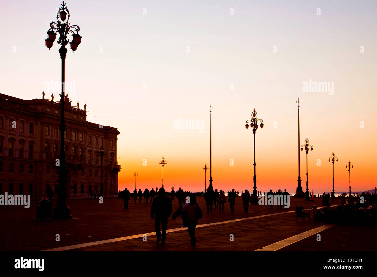 Trieste, Italy - Sunset on Unity of Italy Square facing sea Stock Photo ...