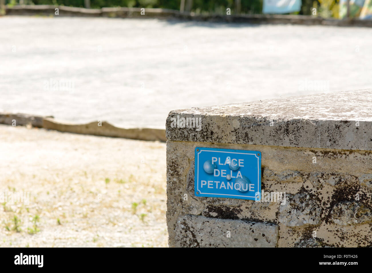 Place de la Petanque (boules) sign on wall in Saint Thomas de Conac ...