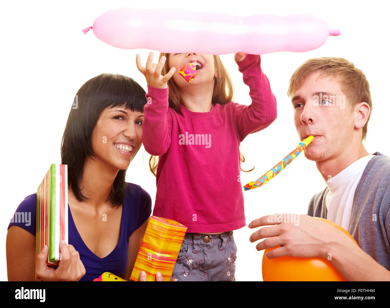 Parents celebrating a birthday with their daughter Stock Photo - Alamy