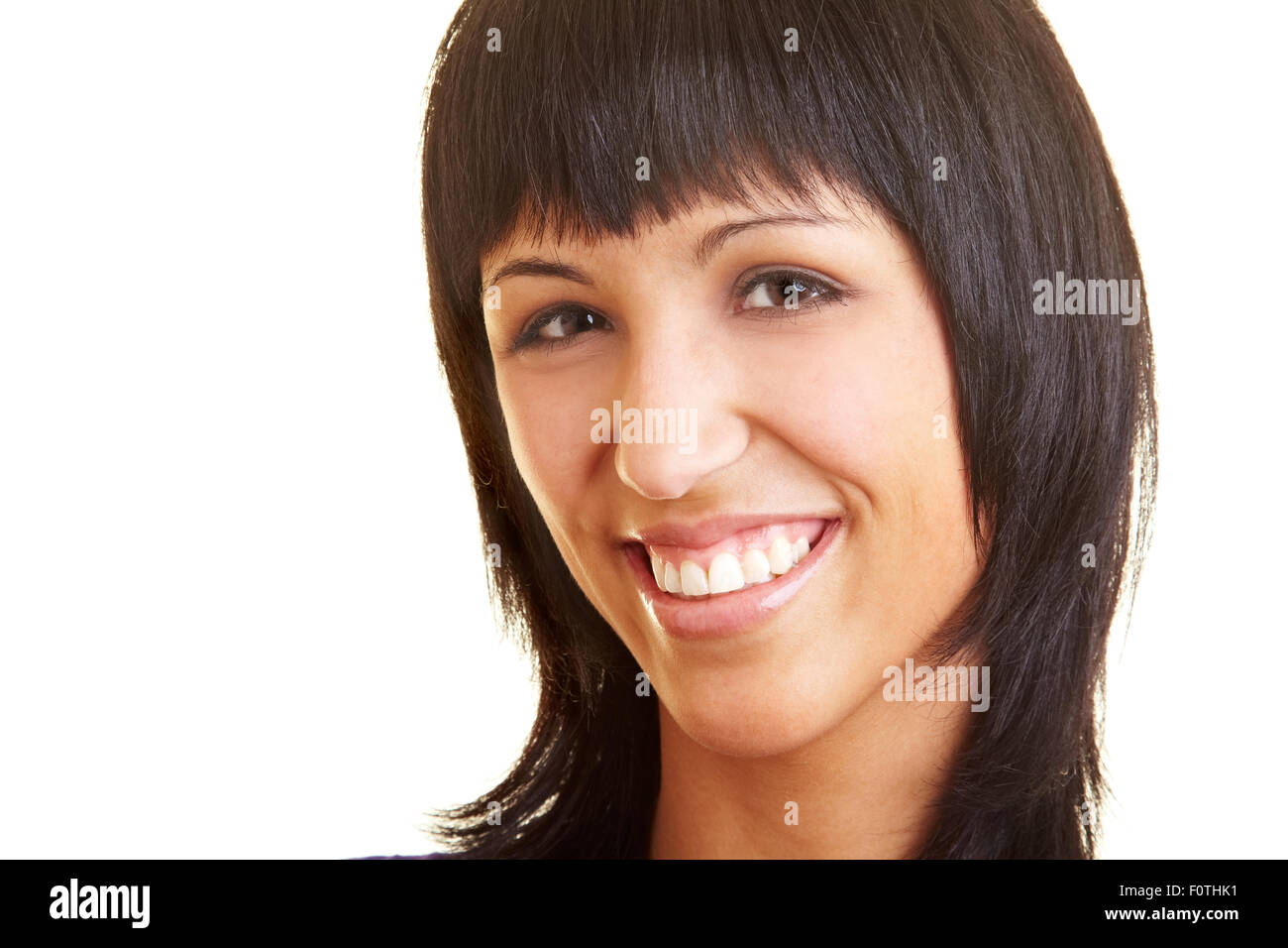 Happy woman smiling into the camera Stock Photo - Alamy