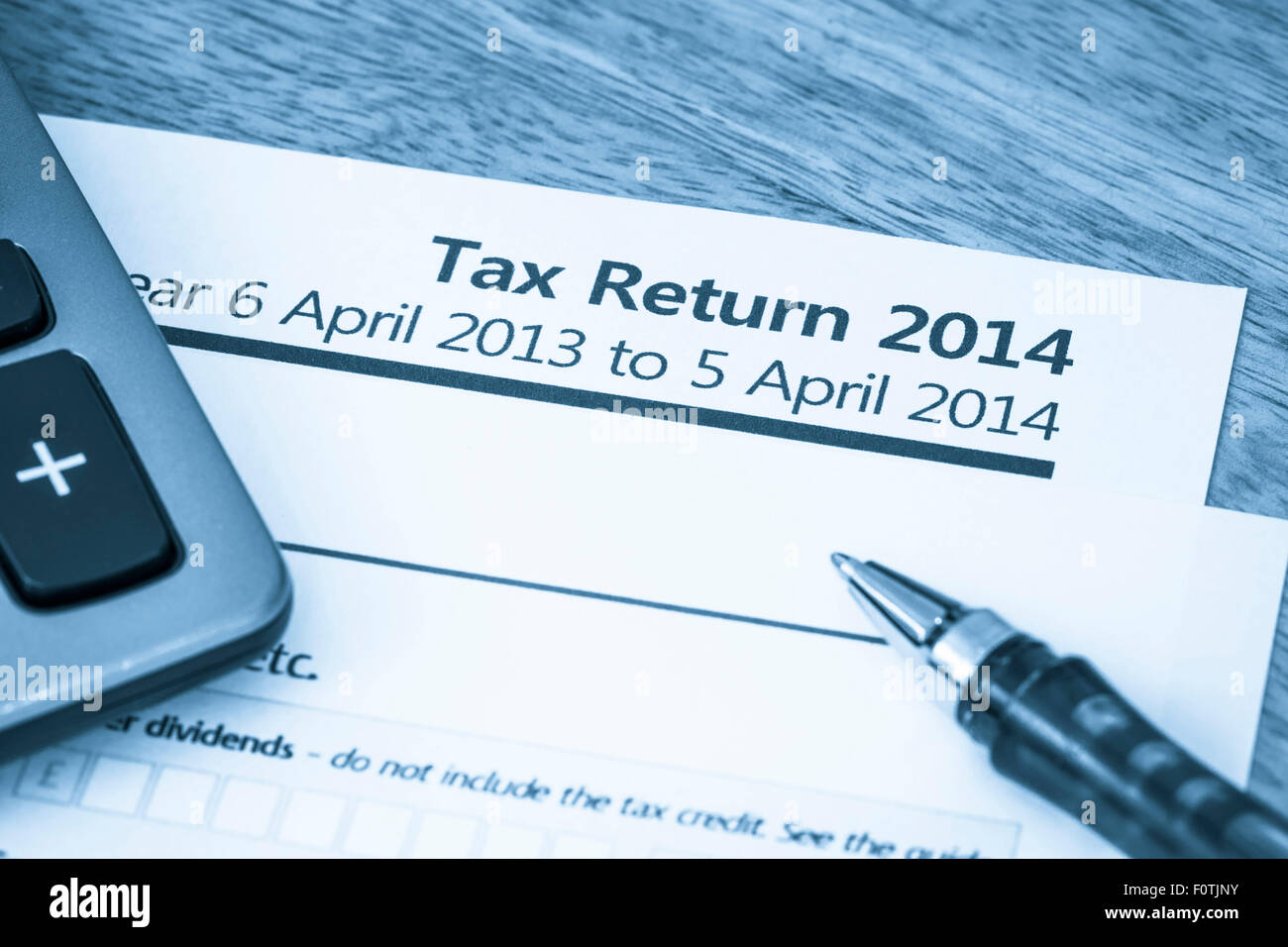 Completing tax return uk hi-res stock photography and images - Alamy