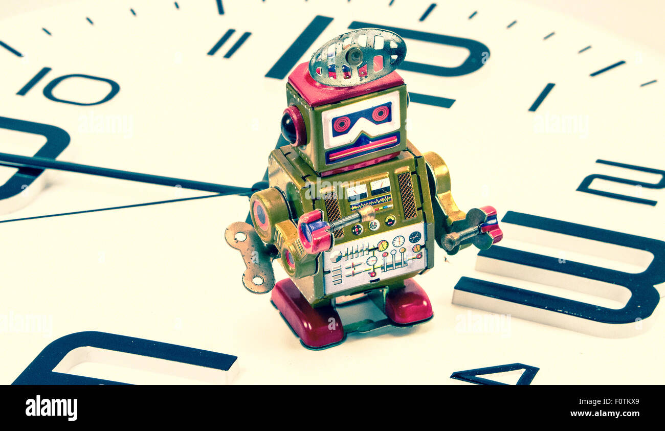 Robot clock time concept work toy hi-res stock photography and images ...