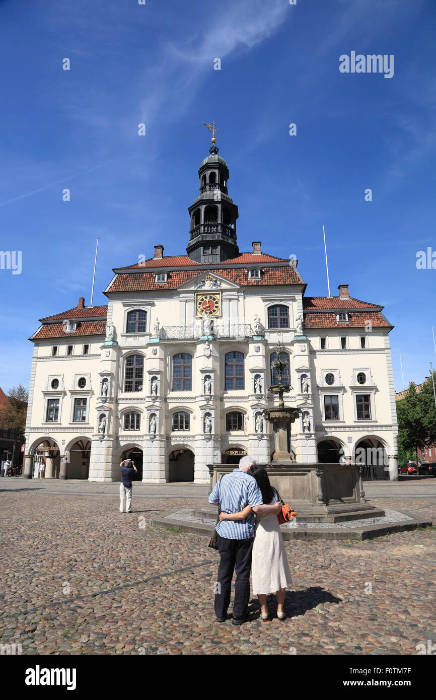 Tourists in front of town hall at market square, Lueneburg, Lüneburg ...