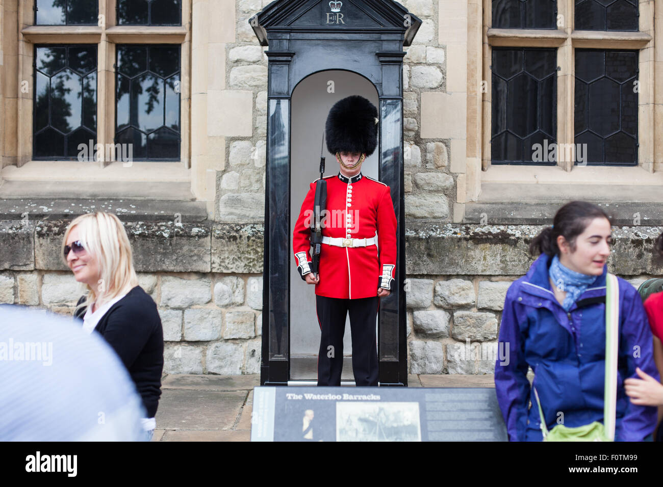 A Royal Guard soldier stands at the Tower of London with rifle and ...