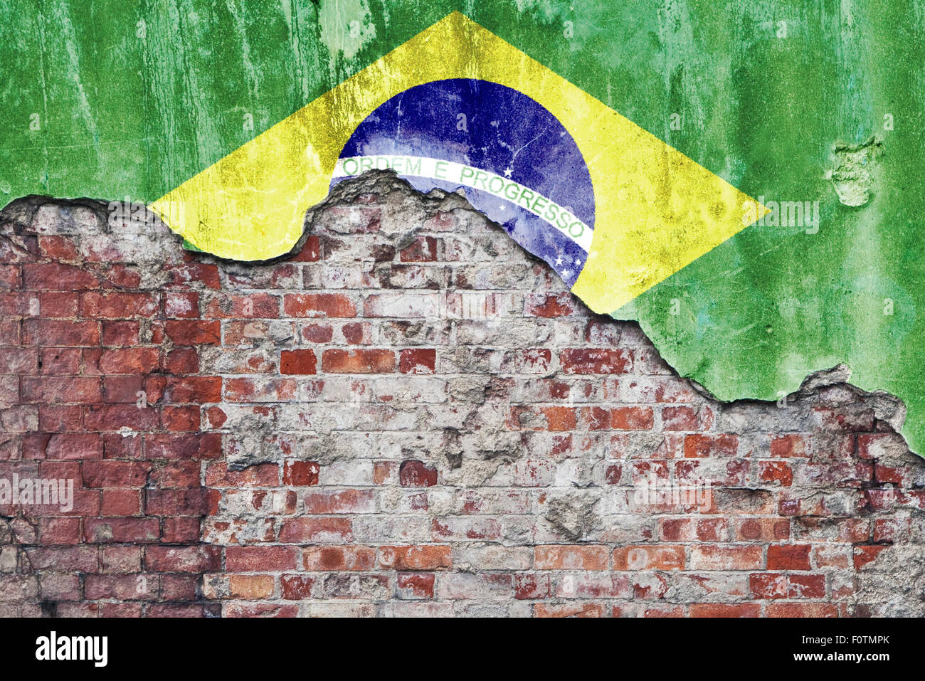 Brazil wall. Grungy old brick wall with Brazilian flag on broken render ...