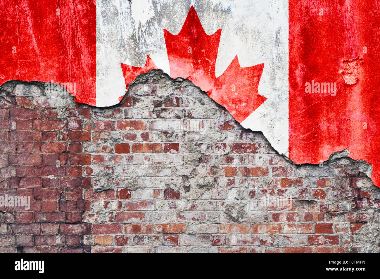 Canada Wall. Grungy old brick wall with Canadian flag on broken render ...