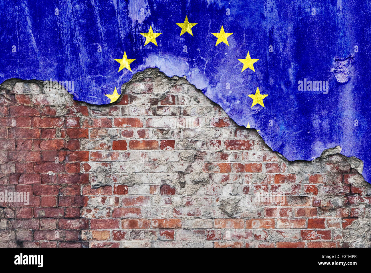 Europe wall. Grungy old brick wall with European Union flag on broken ...
