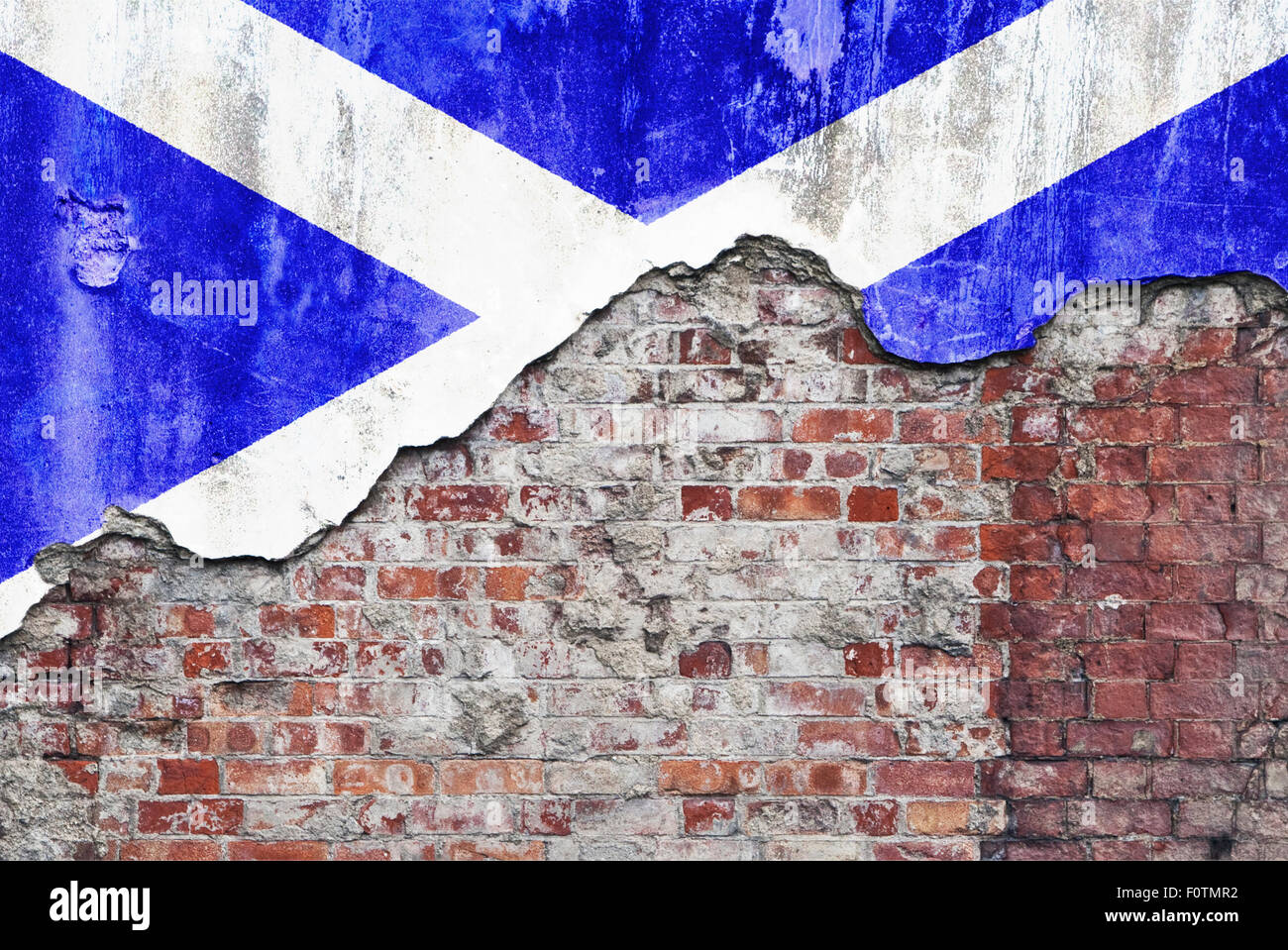 Scotland wall. Grungy old brick wall with Scottish flag on broken ...